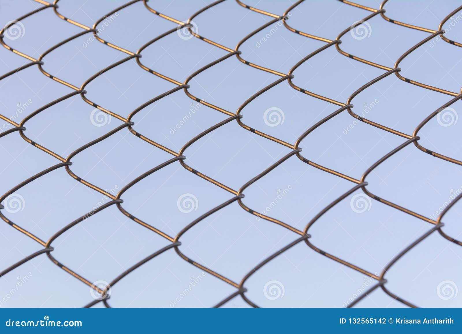 Old and Rusty Iron Net Wrapped on Blue Sky Background Stock Photo ...