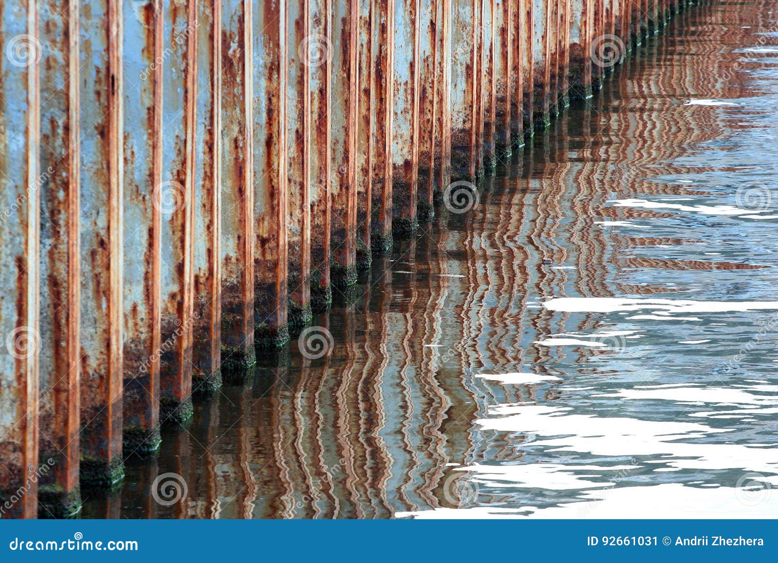Old Rusty Iron Pier Reflected in Water Stock Image - Image of ...