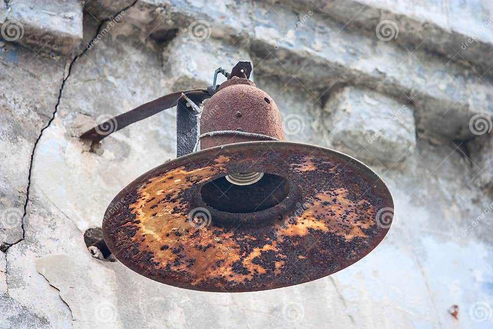 Old Rusty Lamp on the Wall of Abandoned Building Stock Image - Image of ...