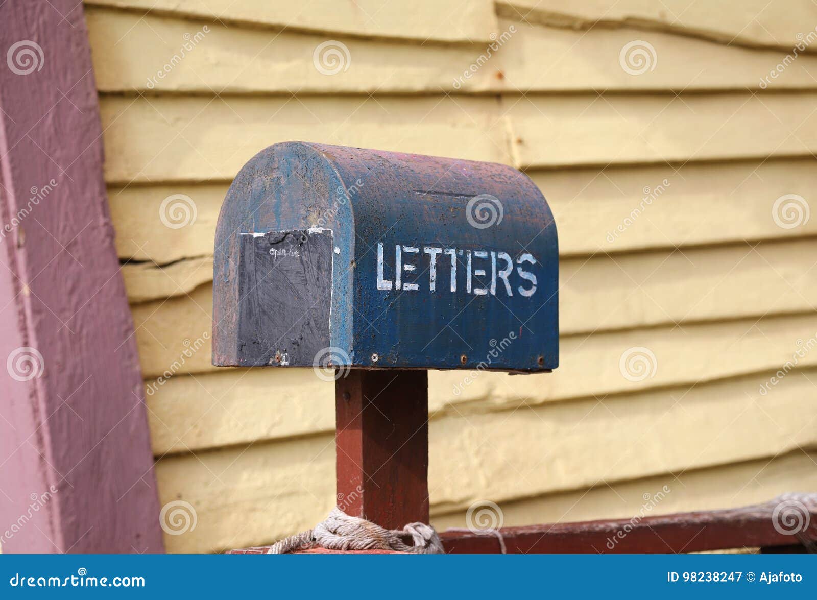 Rusty Letter A Sign Lying On A Wood Texture In Warm Light Stock Image ...