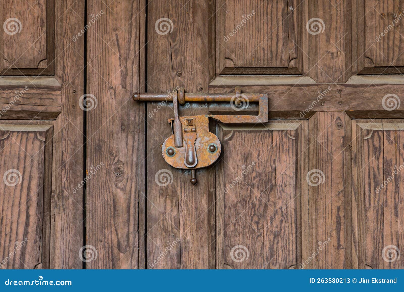 Old Rusty Lock Securing a Rustic Wood Door Stock Image - Image of lock ...