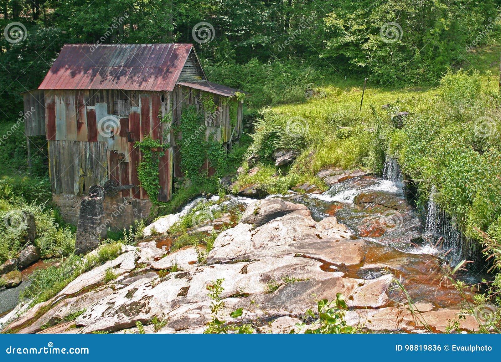 Rusty Mill stock photo. Image of overgrown, maintenance - 98819836