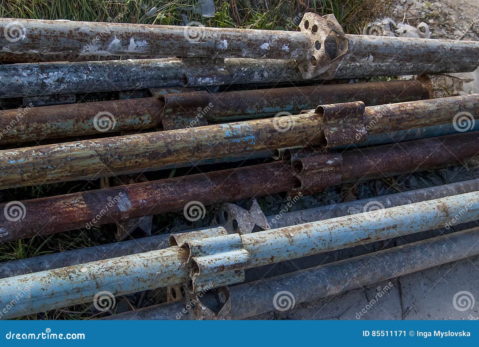 Old rusty metal pipes pile stock image. Image of hold - 85511171
