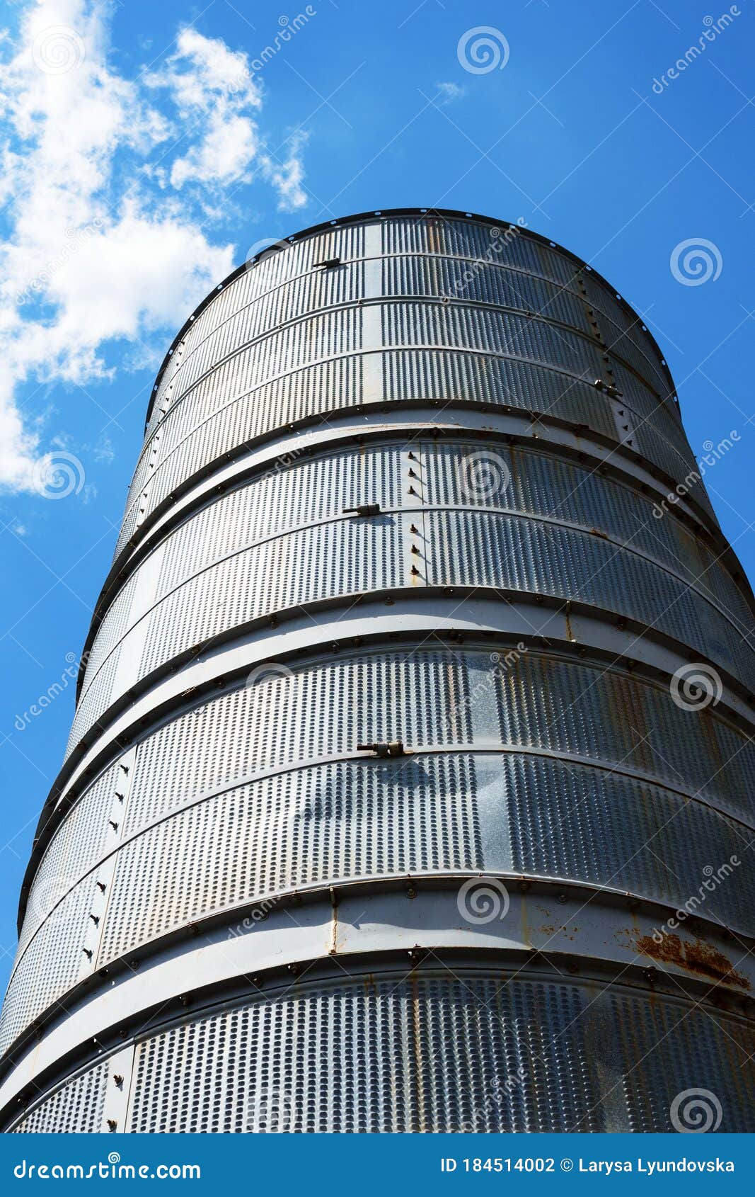 Old Rusty Metal Tower on a Background of Blue Sky. Crisis Concept Stock ...