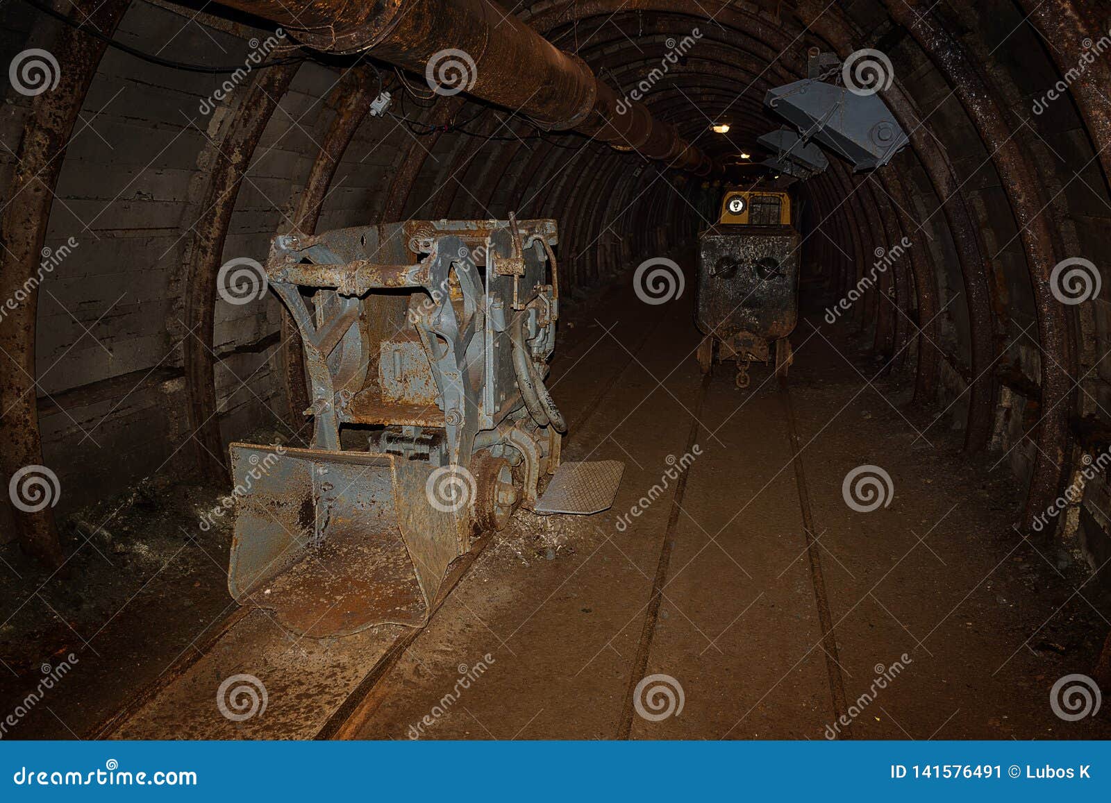 Old And Rusty Mine Machine And Train With Wagons In Mine Shaft With ...