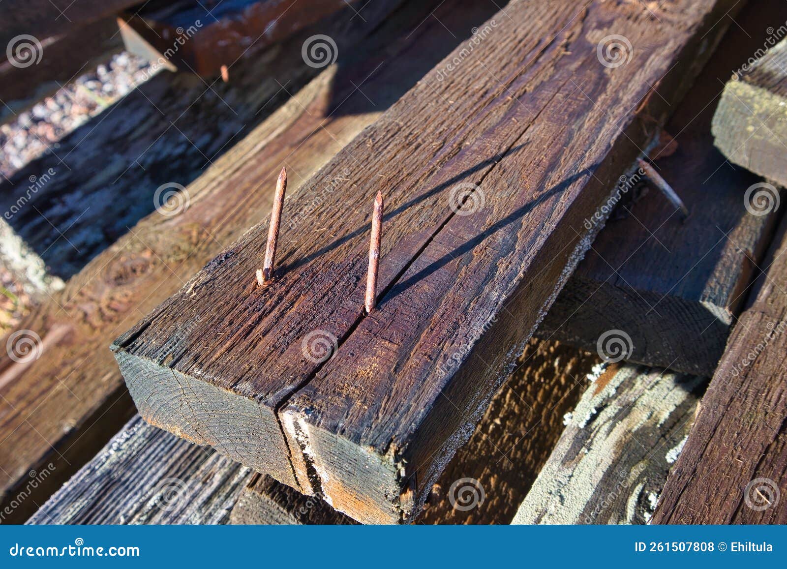 Old Rusty Nails Sticking Out of Wooden Plank Stock Photo - Image of ...
