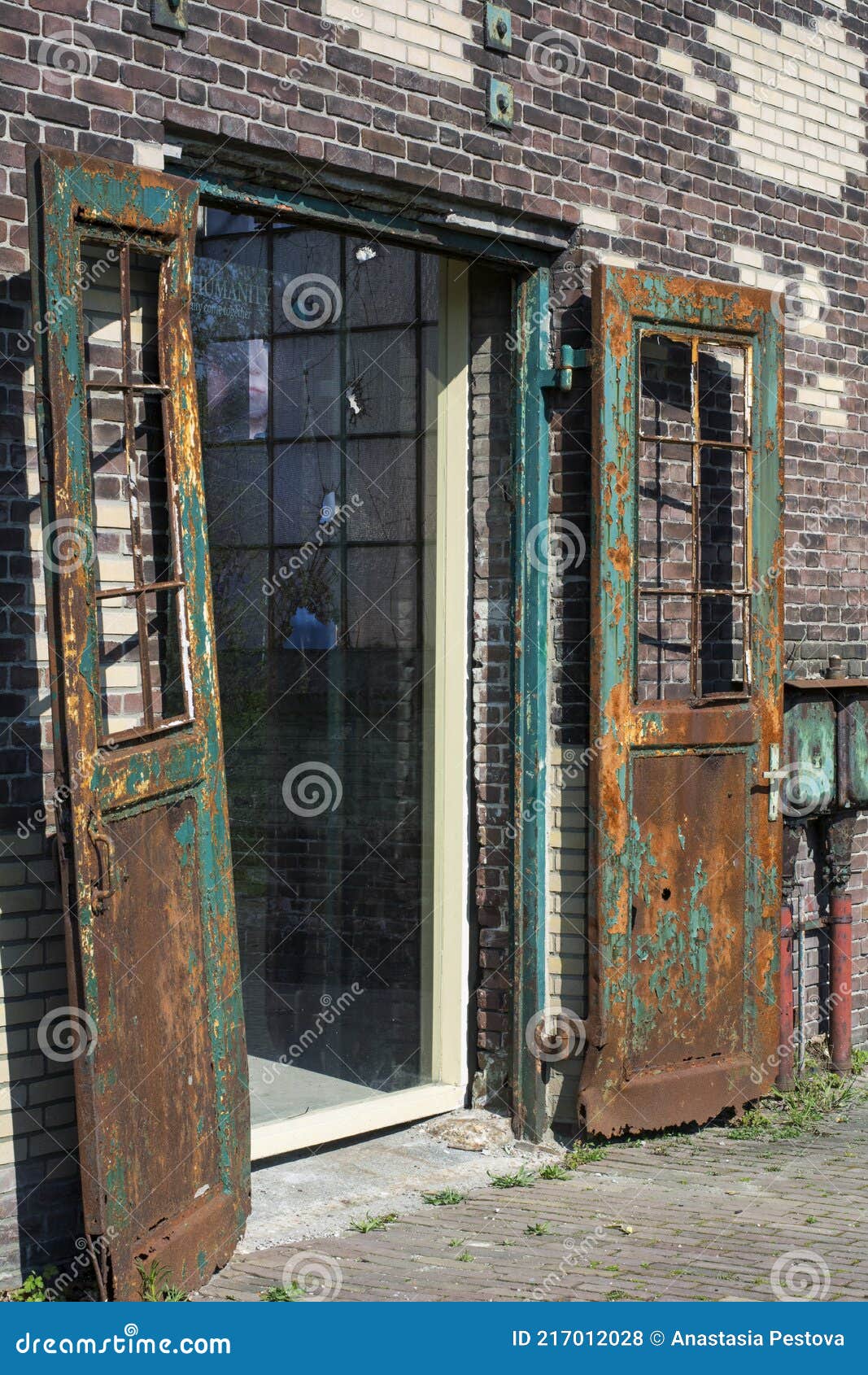 Old Rusty Open Doors in the Sunlight. Ancient Doors Stock Photo - Image ...