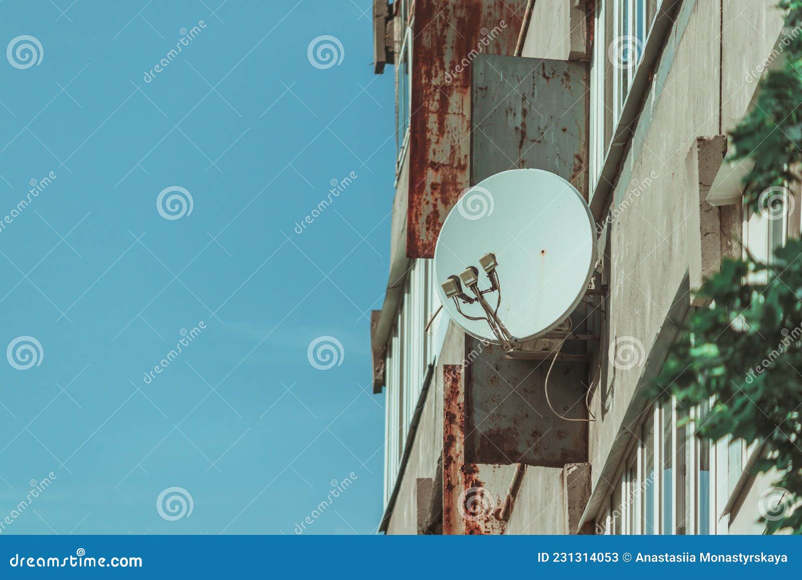Old Rusty Panel House with a White Satellite Dish for Television. Stock ...