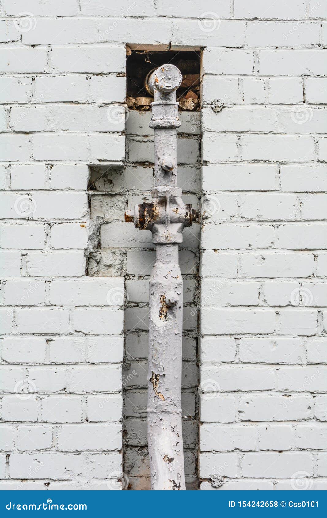 Old Rusty Pipe with Valves on Painted White Classic Brick Wall Stock ...