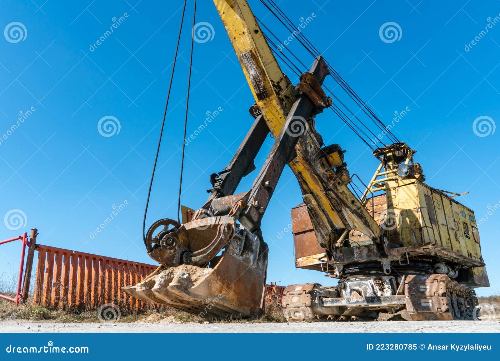 An Old Rusty Quarry Excavator is Located on the Territory of a Mining ...