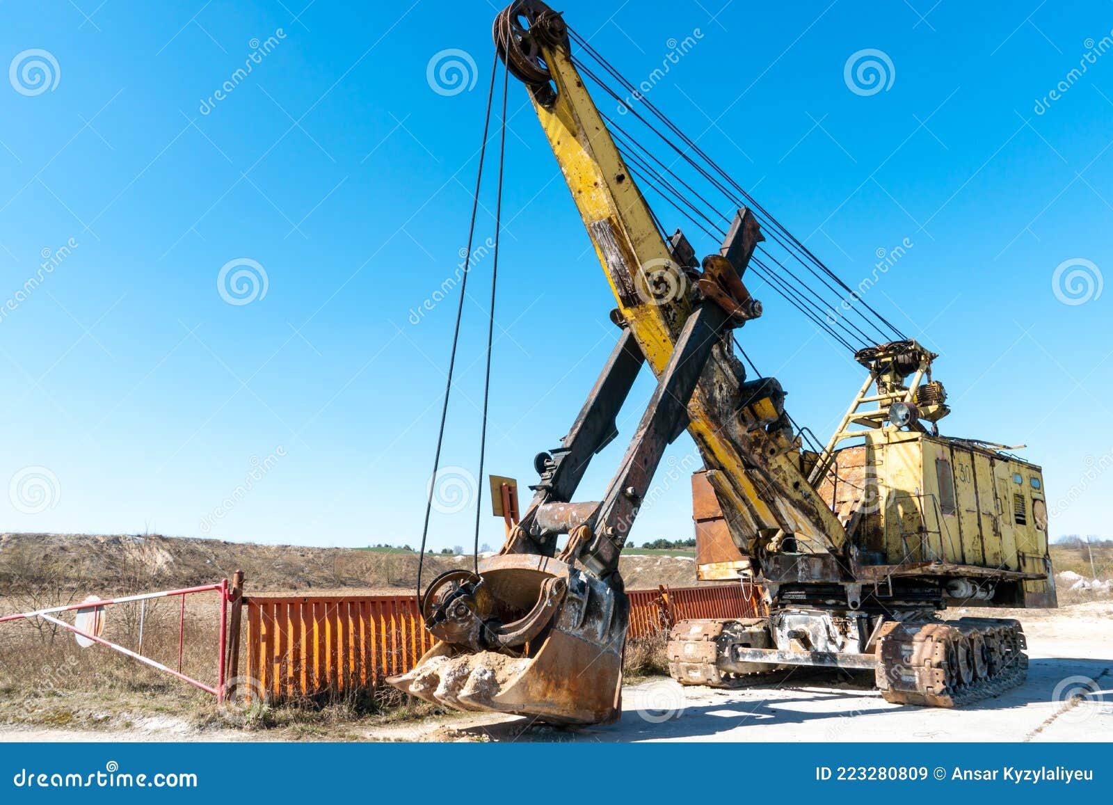 An Old Rusty Quarry Excavator is Located on the Territory of a Mining ...