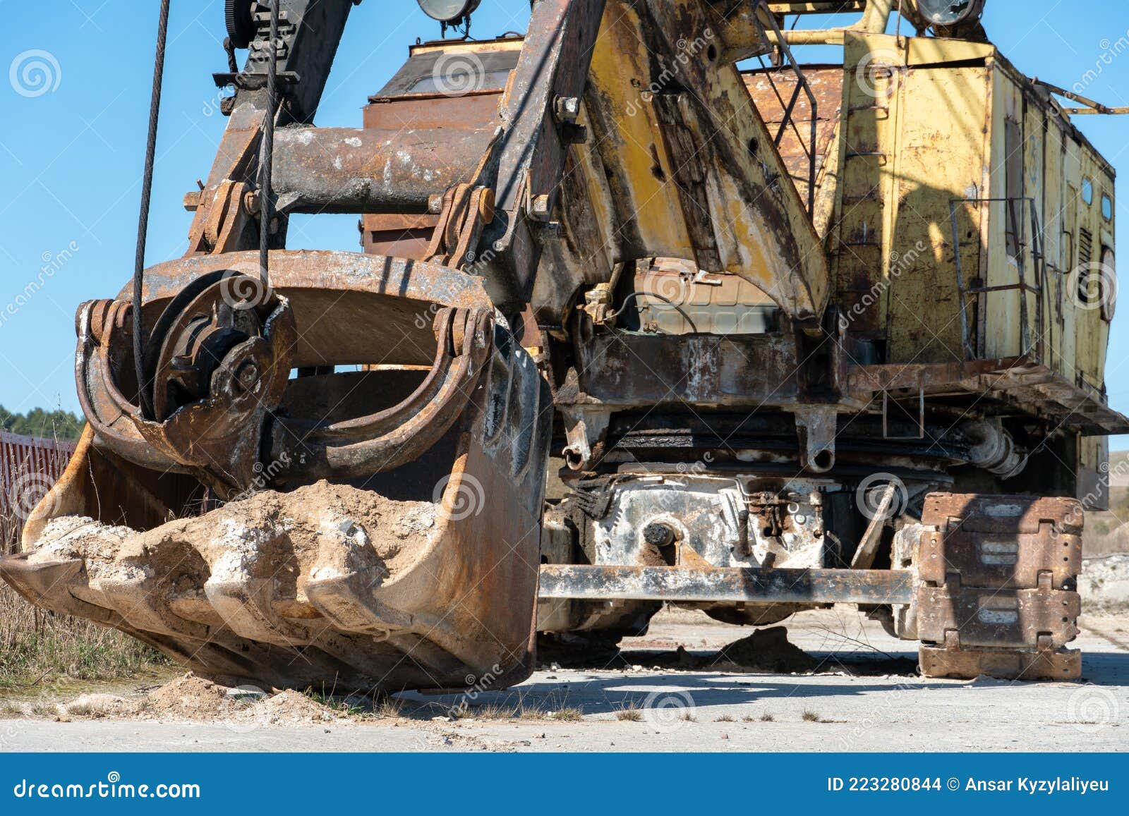 An Old Rusty Quarry Excavator Is Located On The Territory Of A Mining ...