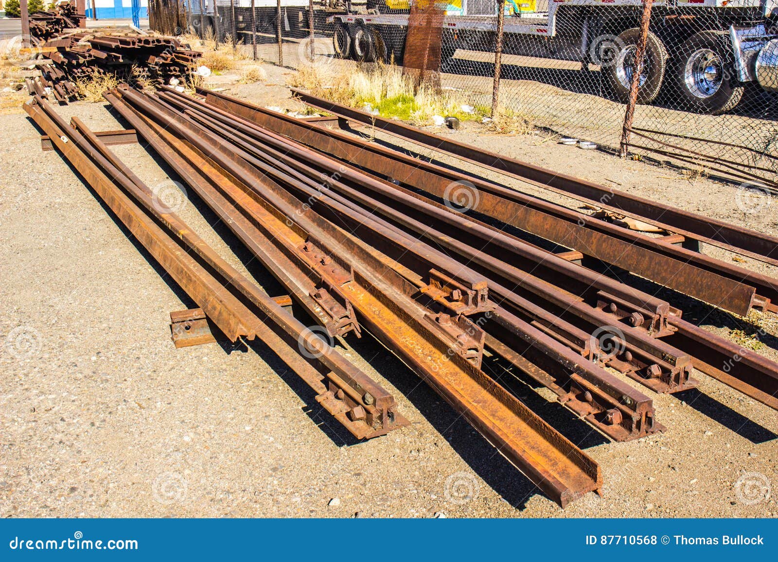 Old Rusty Railroad Rails Stacked by Side of Road Stock Photo - Image of ...