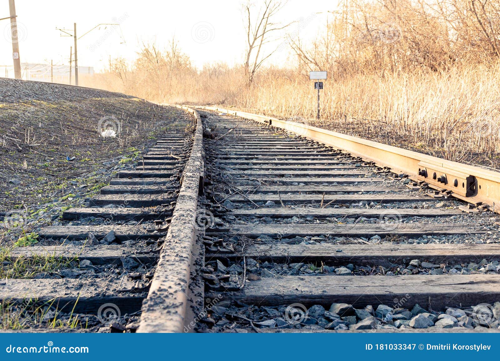 Old Rusty Rails Covered with Debris and Dirt Go into the Distance for ...