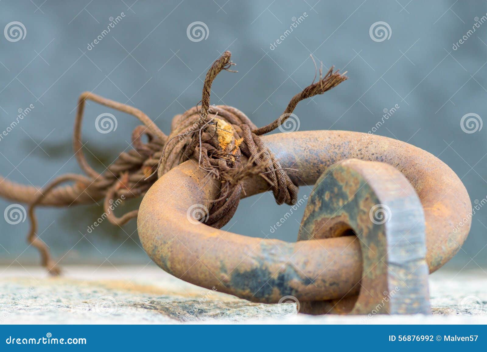 Old Rusty Ring with the Broken-off Iron Cable Stock Photo - Image of ...