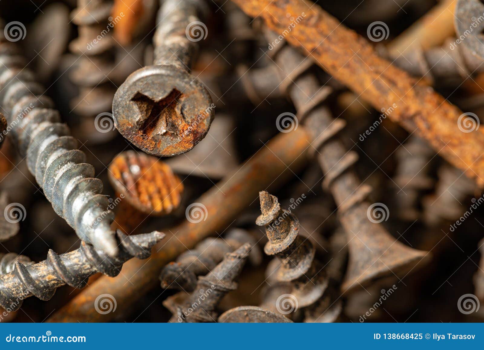 Old Rusty Screws and Nails. Background for Construction and Industry ...