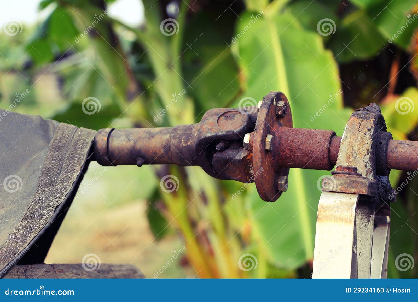 The Old and Rusty Shaft of the Water Pump Stock Photo - Image of ...