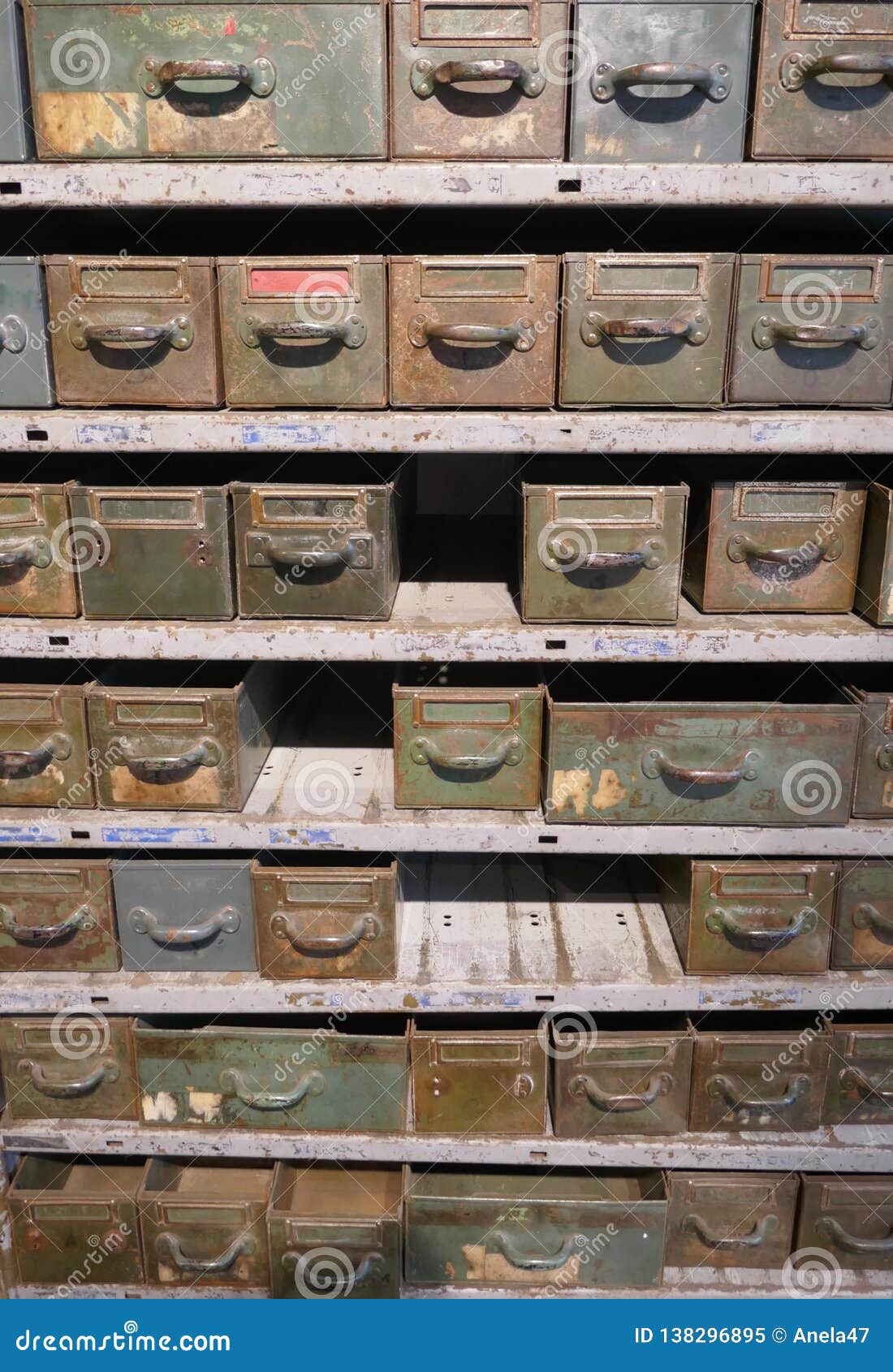 Old Rusty Shelf with Many Drawers and Boxes for in a Disused Workshop ...