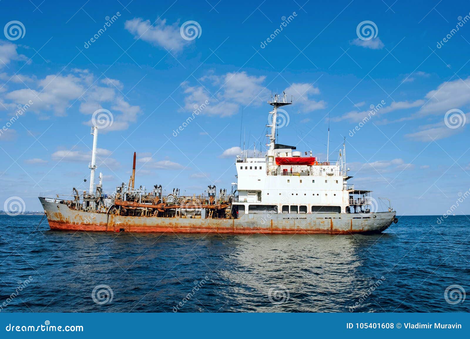 Old Rusty Ship in the Blue Sea Stock Photo - Image of sailing, industry ...