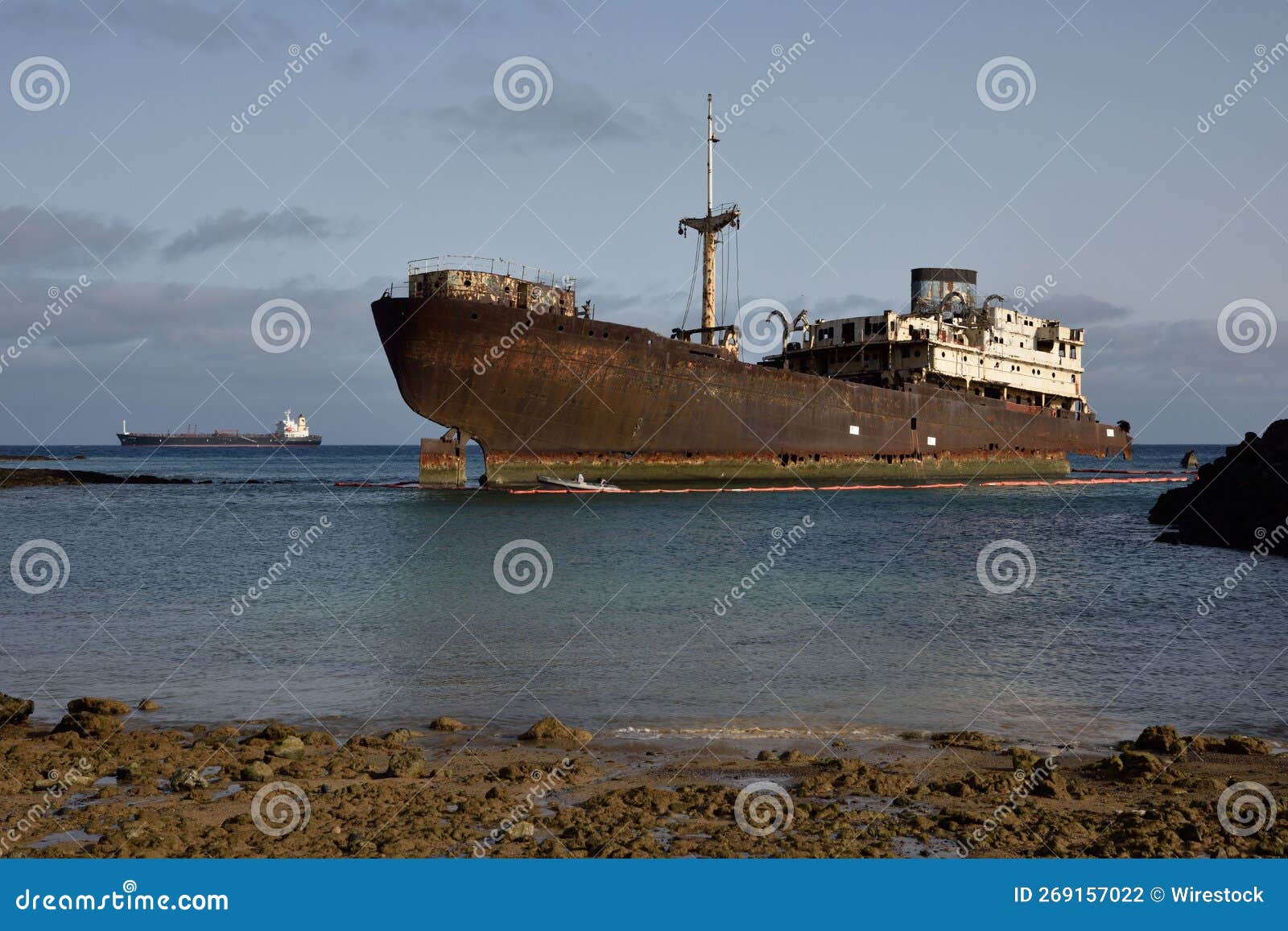 Old rusty ship in a harbor stock photo. Image of rusty - 269157022
