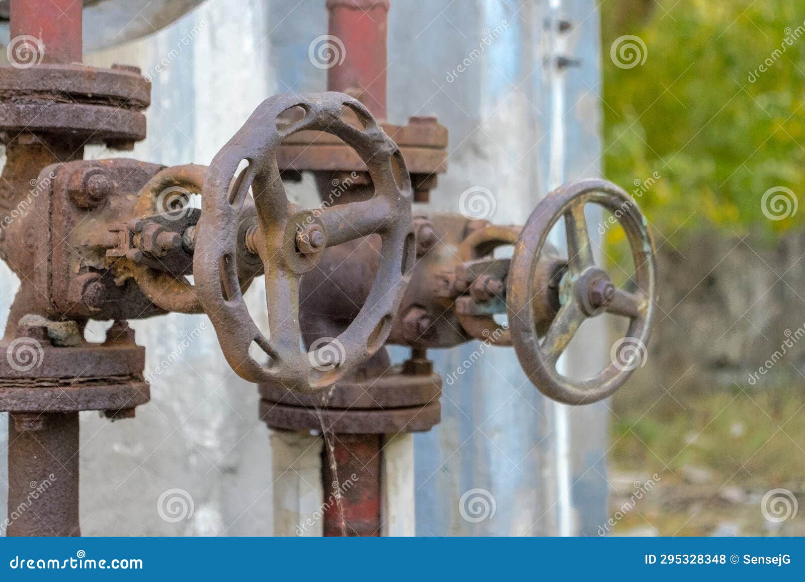 Old Rusty Steel Valve Knobs on the Wall of a Historic Water Tower ...