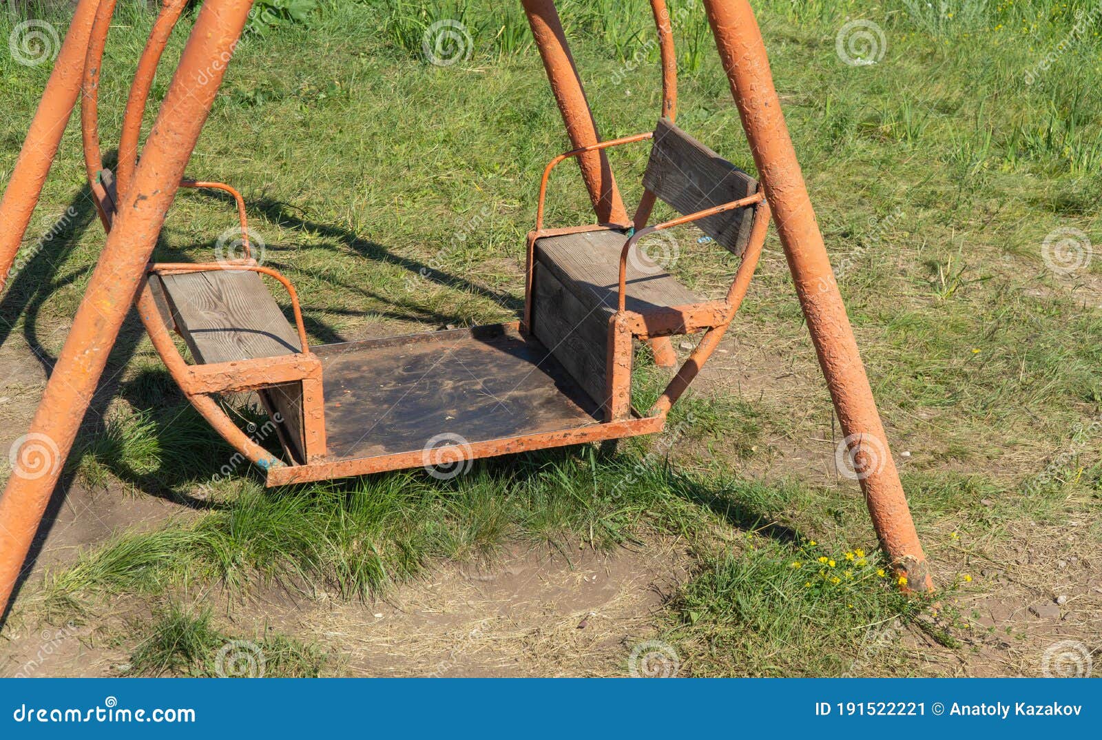 Old Rusty Swing on the Grass. Empty Swings, the Concept of Kidnapping ...