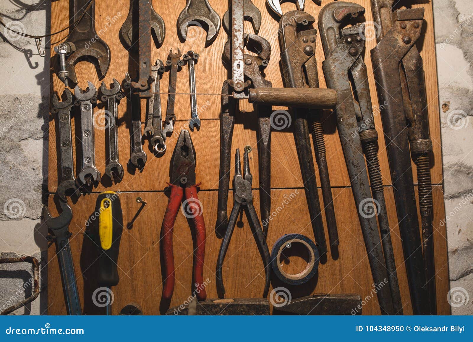 Old Rusty Tools Hang on the Wall Stock Photo - Image of iron, hammer ...