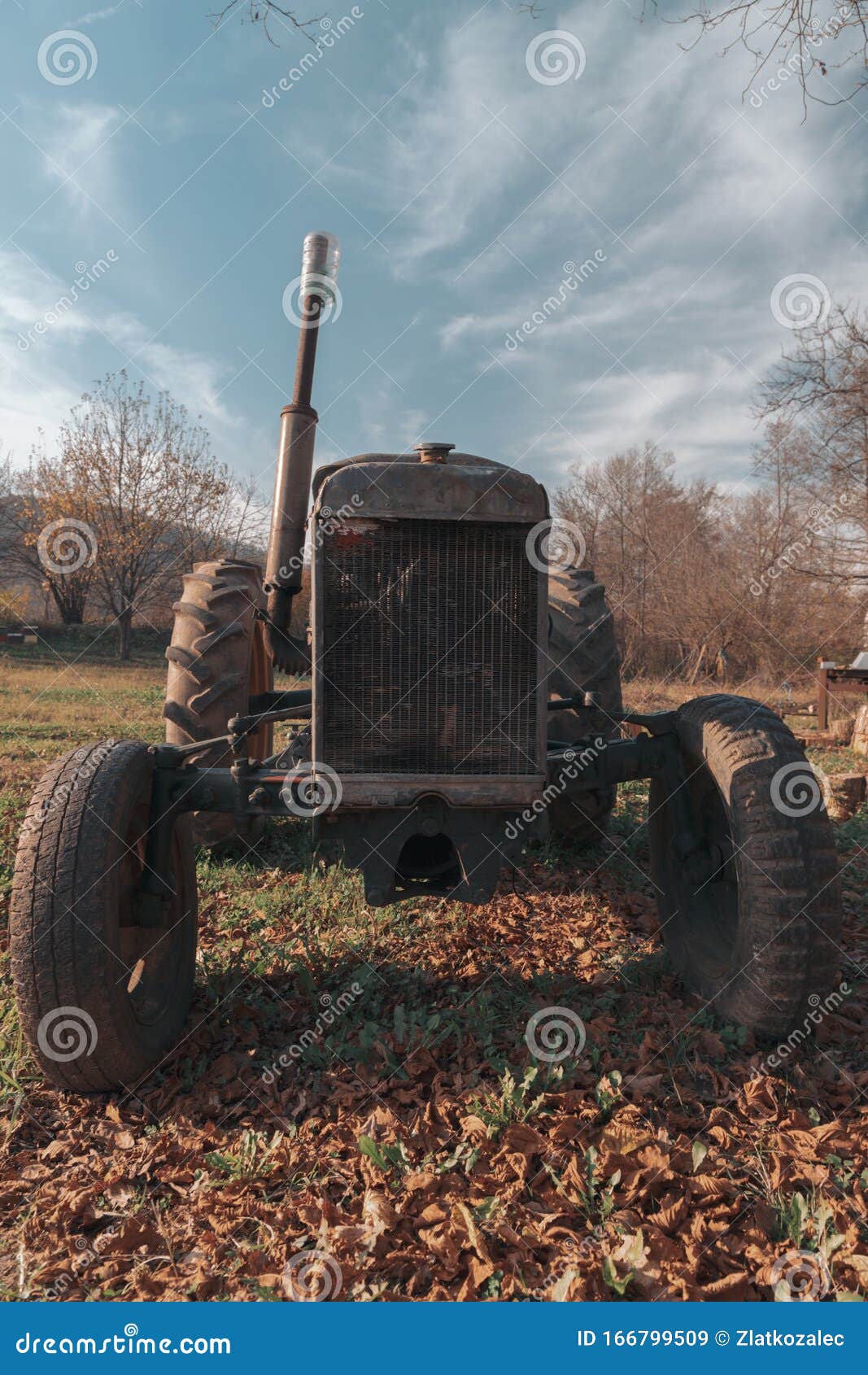 Old Rusty Tractor in a Field on a Sunny Day Stock Image - Image of ...