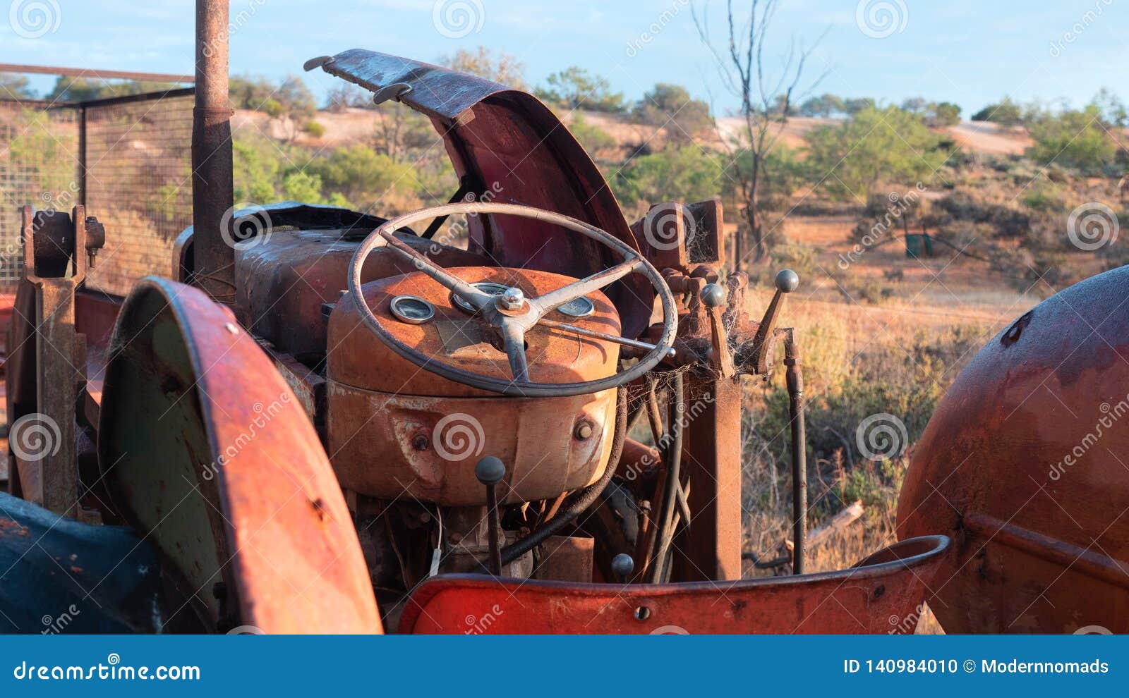 Old, Rusty Tractor on a Junk Yard in the Outback Stock Photo - Image of ...