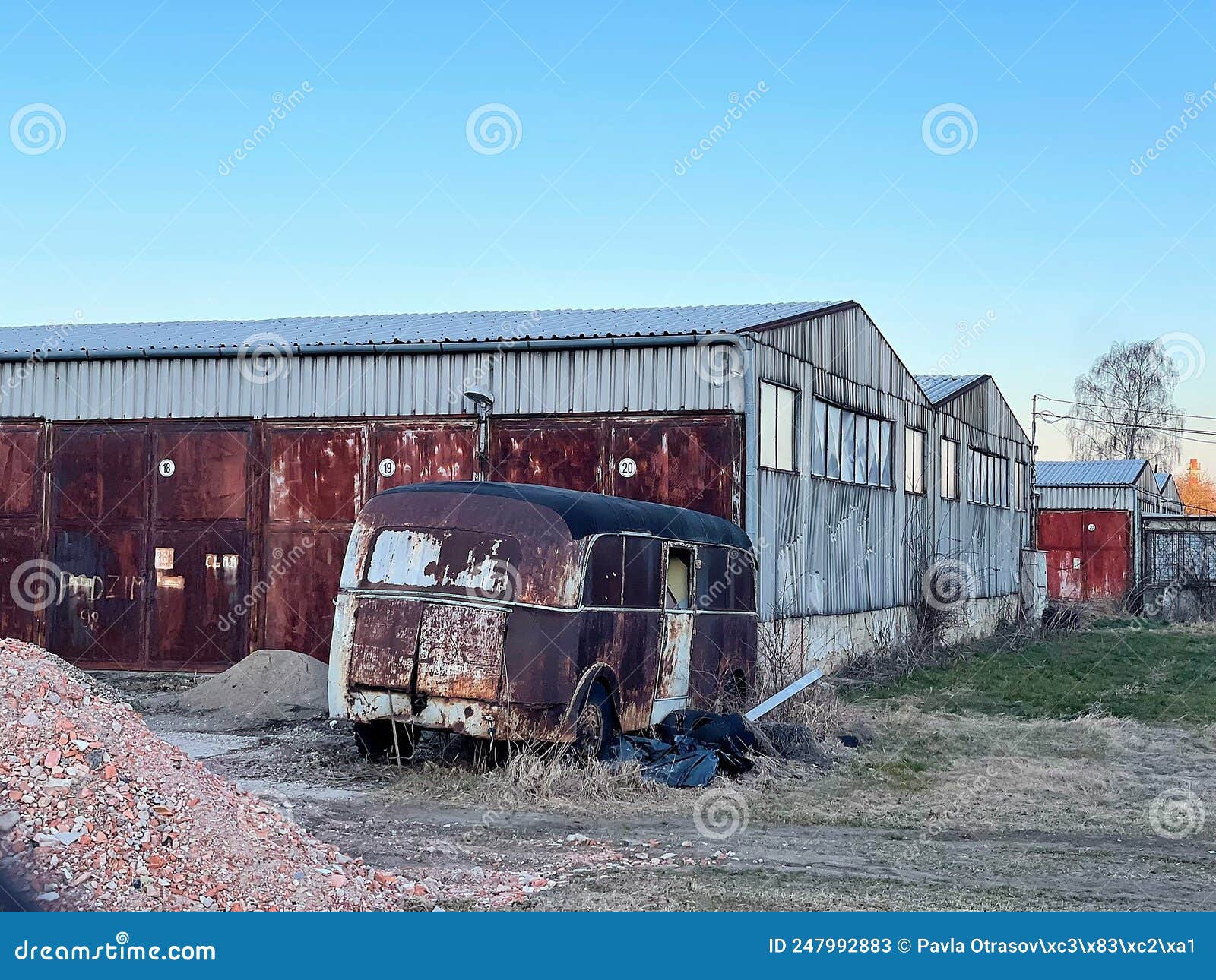 Old Rusty Trailer and Rusty Buidings Stock Image - Image of barracks ...