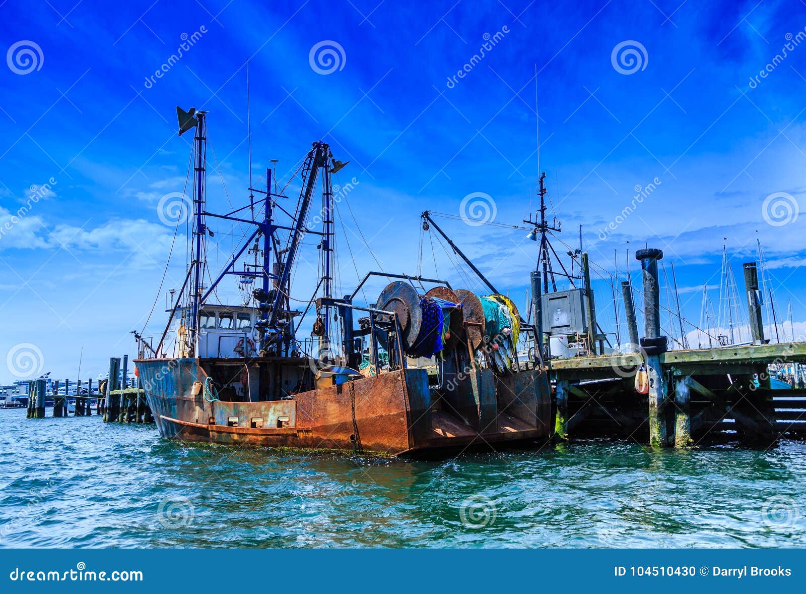 Old rusty trawler at dock stock photo. Image of yachts - 104510430
