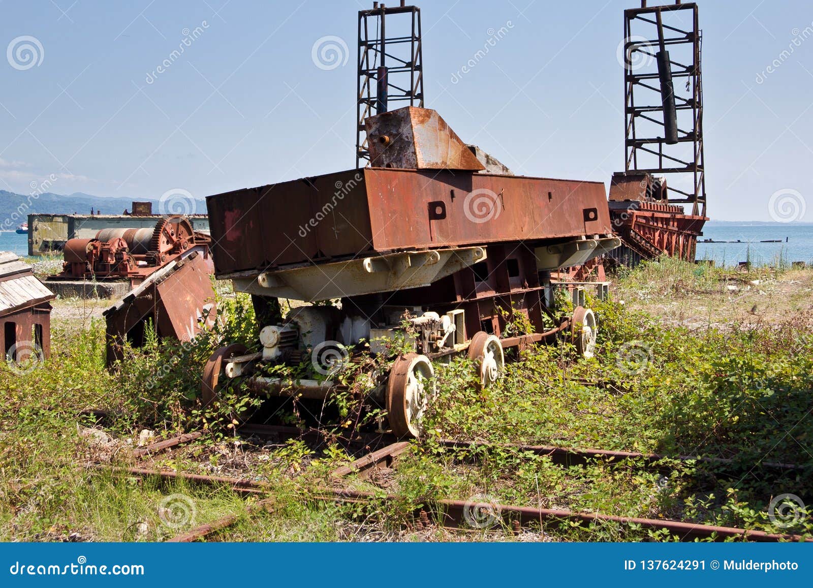 Old Rusty Trolley on Overgrown Rails at Abandoned Port Stock Image ...
