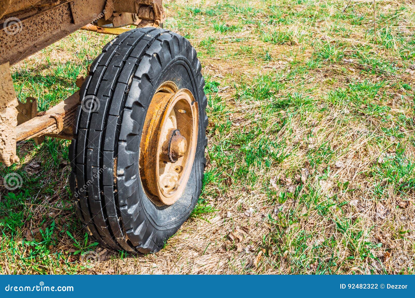 Old Rusty Truck Wheel and Rubber Tire. Stock Photo - Image of change ...