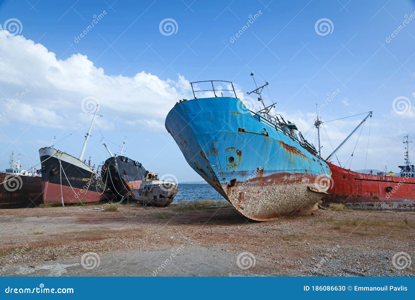 Old Rusty Vessels in a Scrap Yard Stock Photo - Image of marine, blue ...