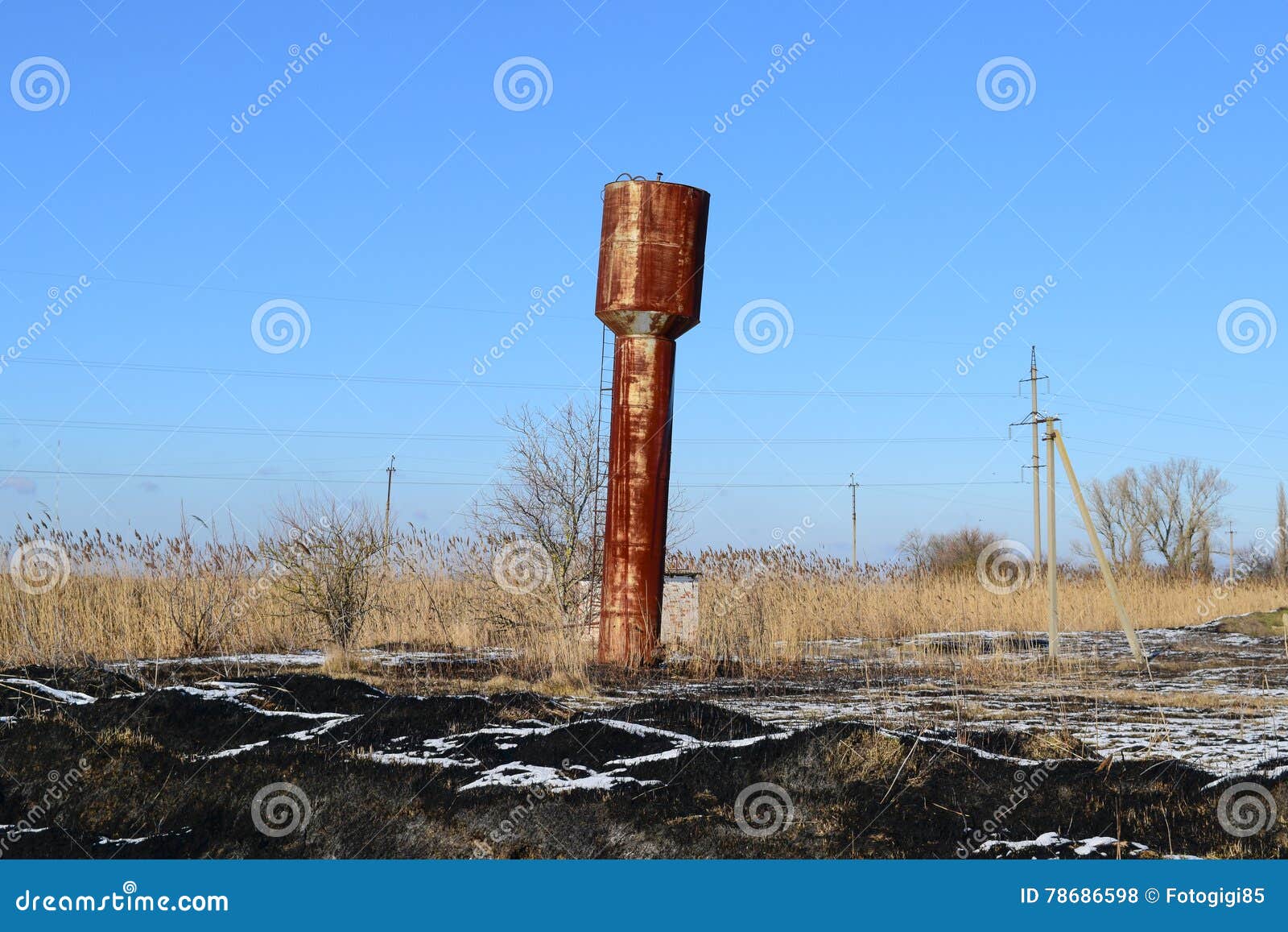 The Old Rusty Water Tower Tilted. Stock Photo - Image of preserve ...