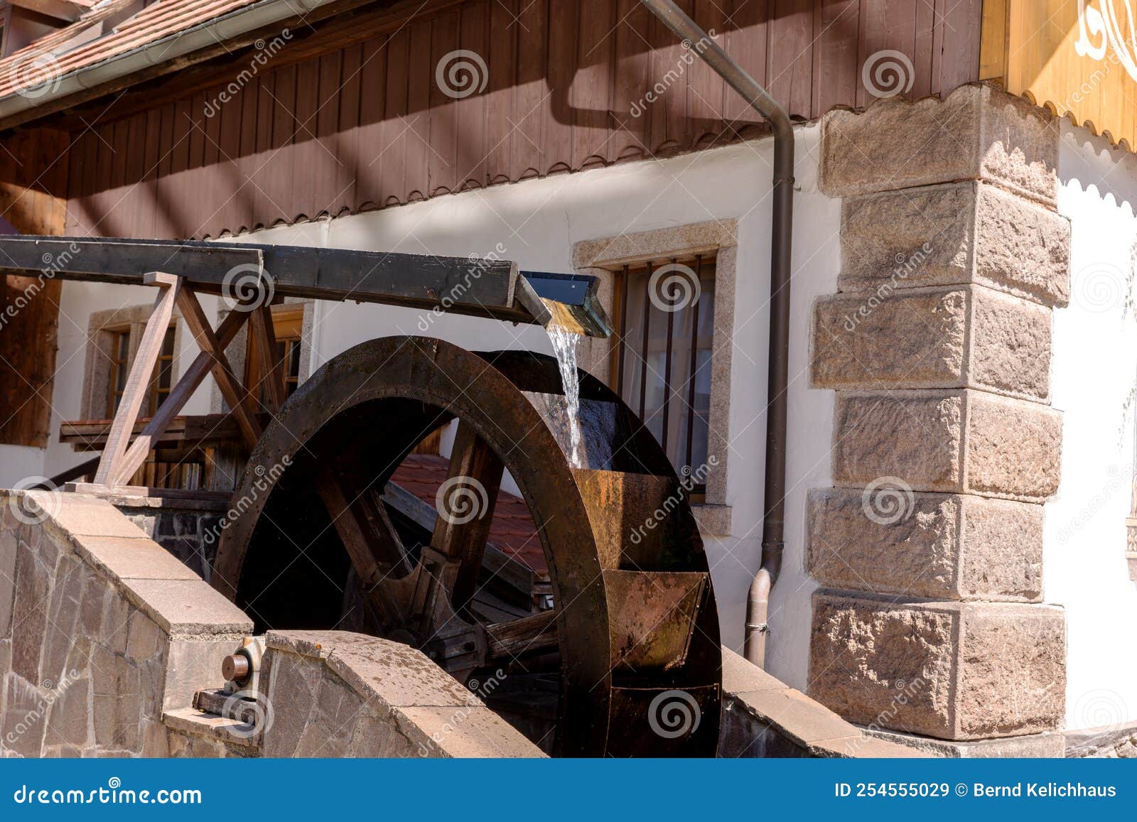 Old Rusty Water Wheel of the Restored Mill Stock Image - Image of rusty ...