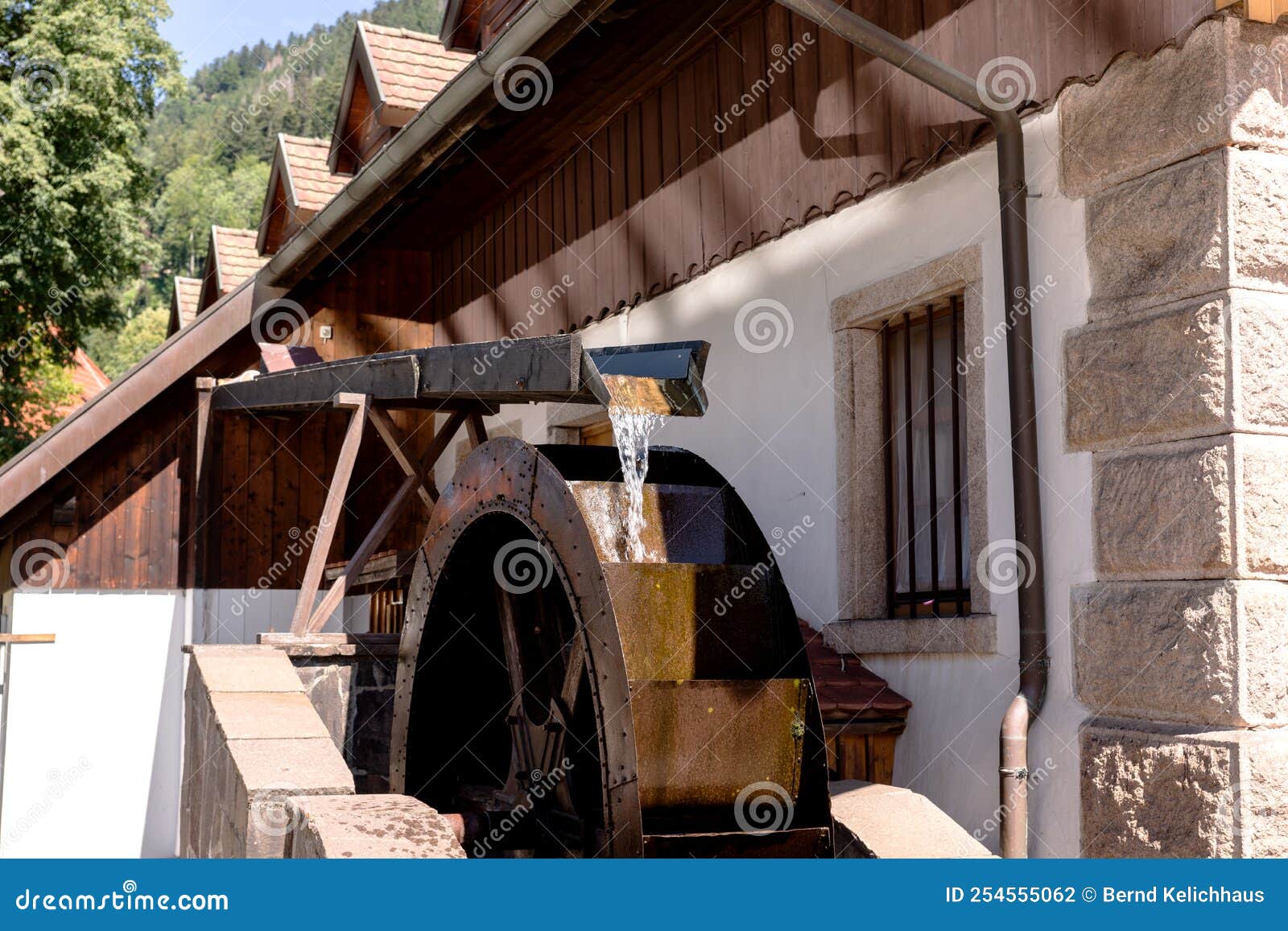 Old Rusty Water Wheel of the Restored Mill Stock Photo - Image of ...