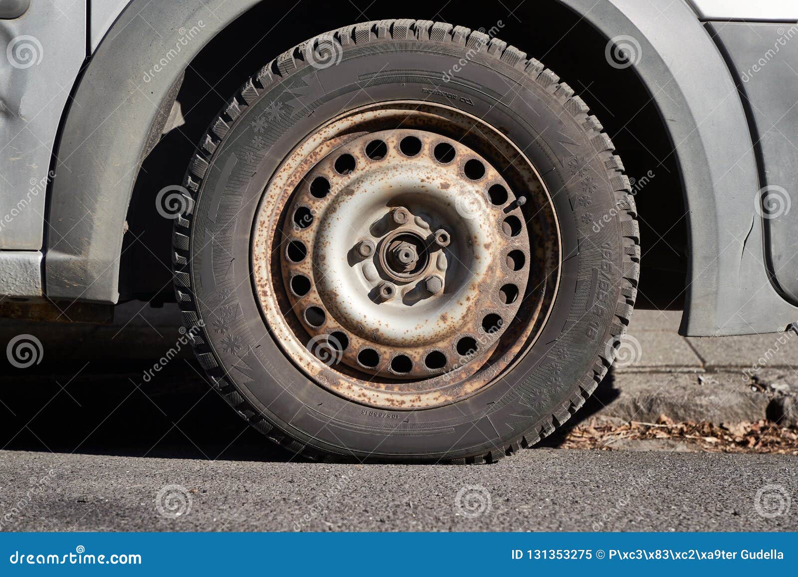 Rusty Car Wheel stock image. Image of metal, imprints - 131353275