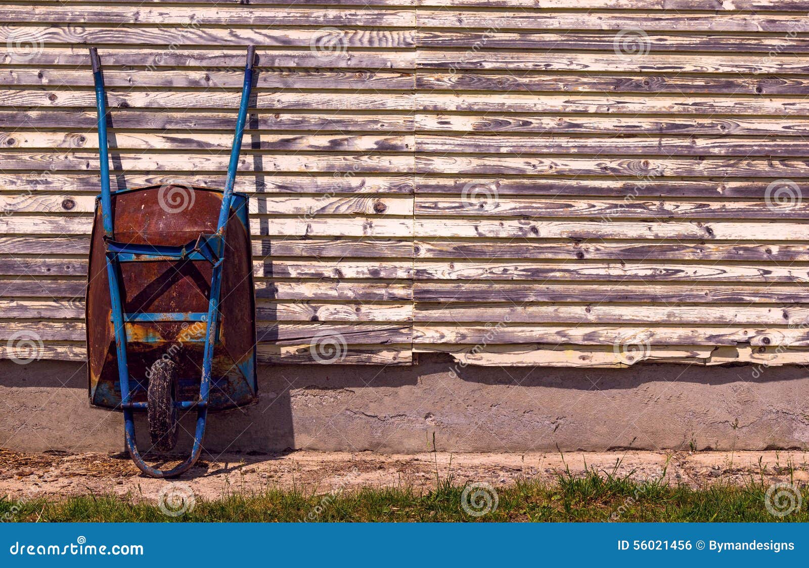 Old rusty wheelbarrow stock photo. Image of damaged, farm - 56021456