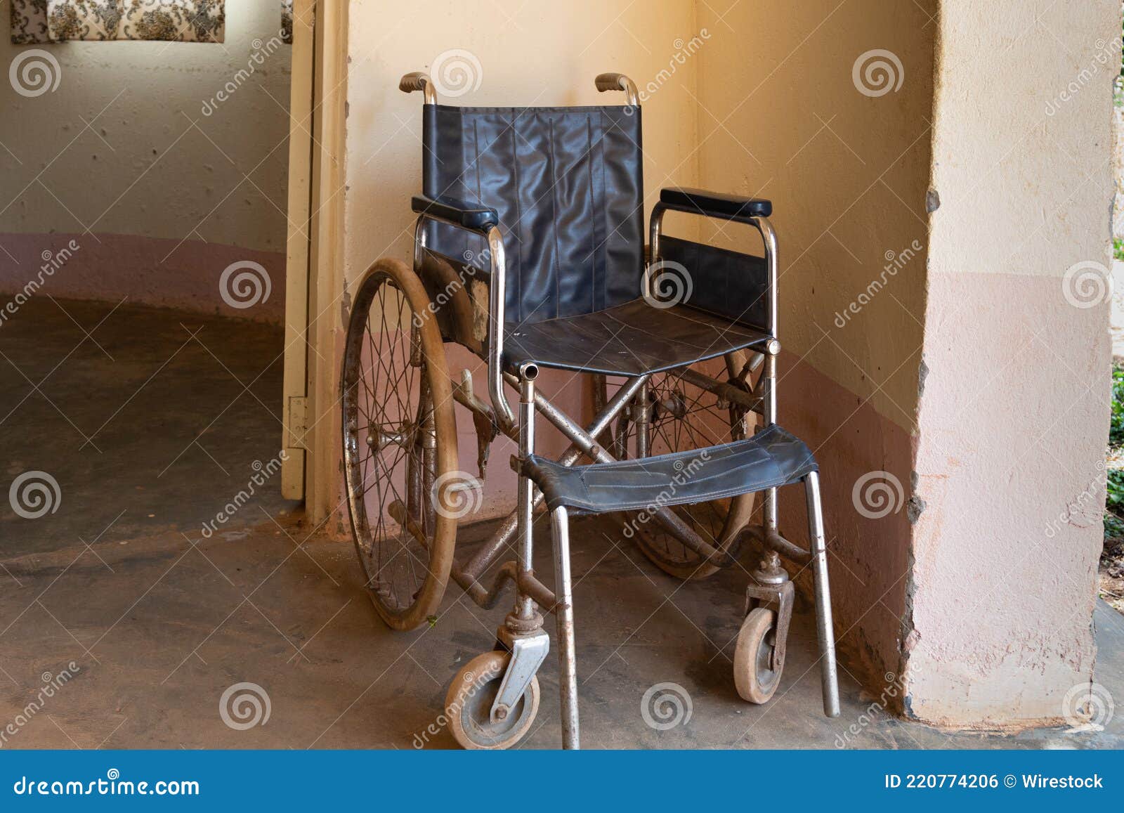 An Old, Rusty Wheelchair in a Hospital in Uganda Stock Photo - Image of ...