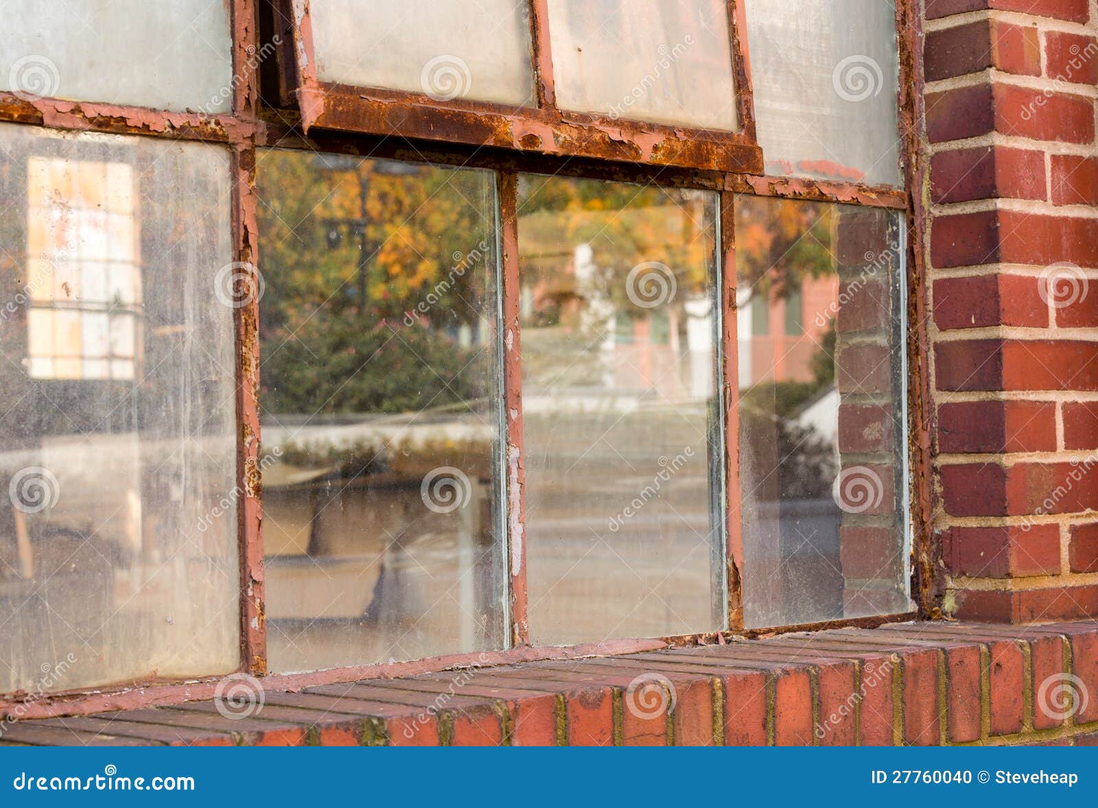 Old Rusty Window in Warehouse Reflecting Fall Stock Photo - Image of ...