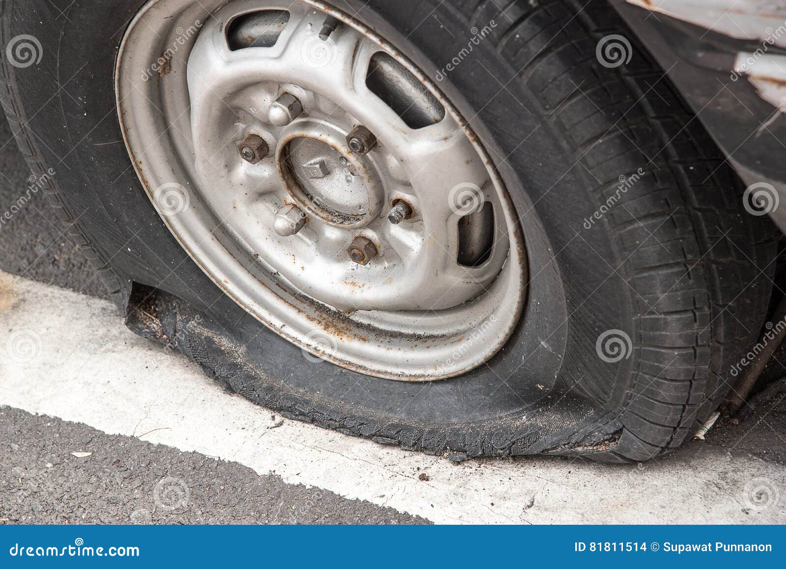 Old Rusty Wrecked Car with a Punctured Tire. Stock Photo - Image of ...