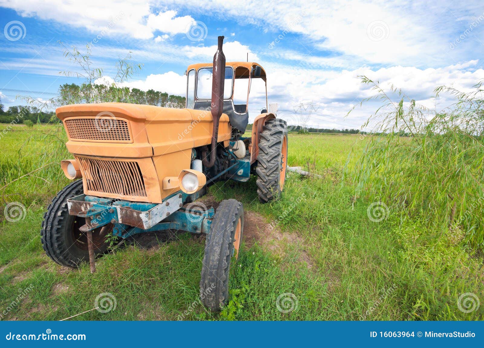 Old Rusty Yellow Farm Vehicle Stock Photo - Image of food, blue: 16063964