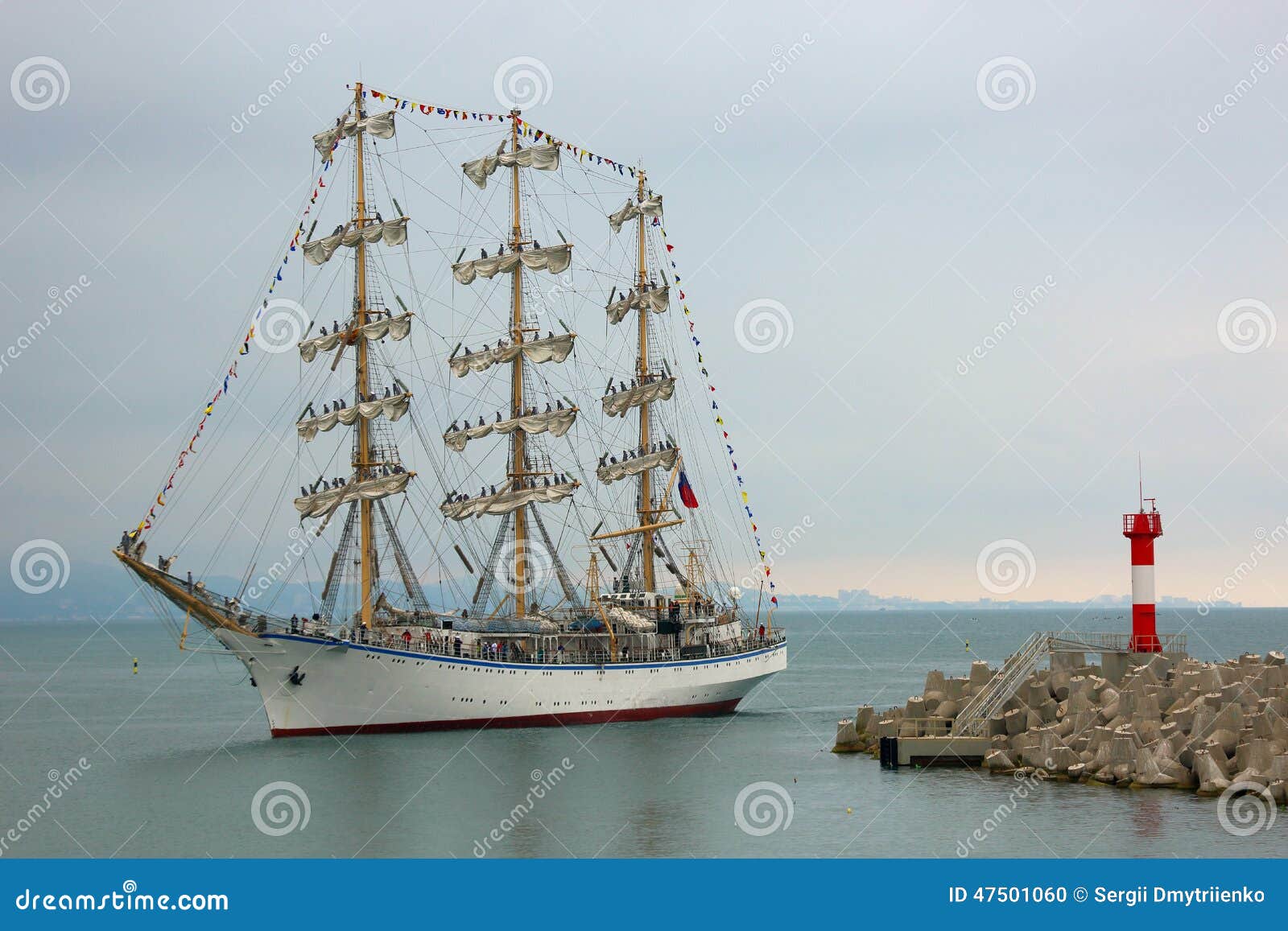 Old Sailing Ship in Front of the Lighthouse Stock Photo - Image of ...