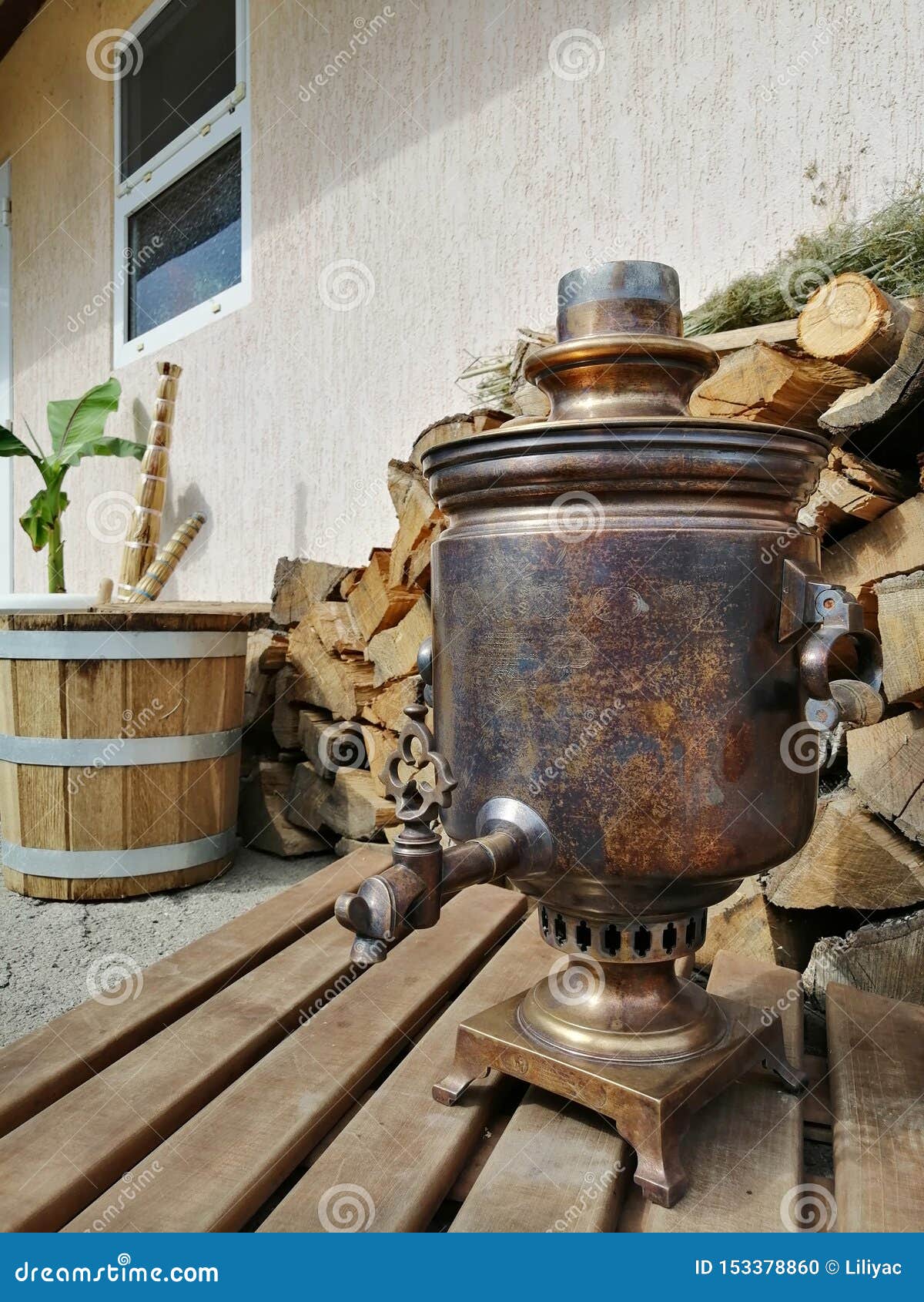 Old Samovar on the Background of Firewood Stock Photo - Image of black ...