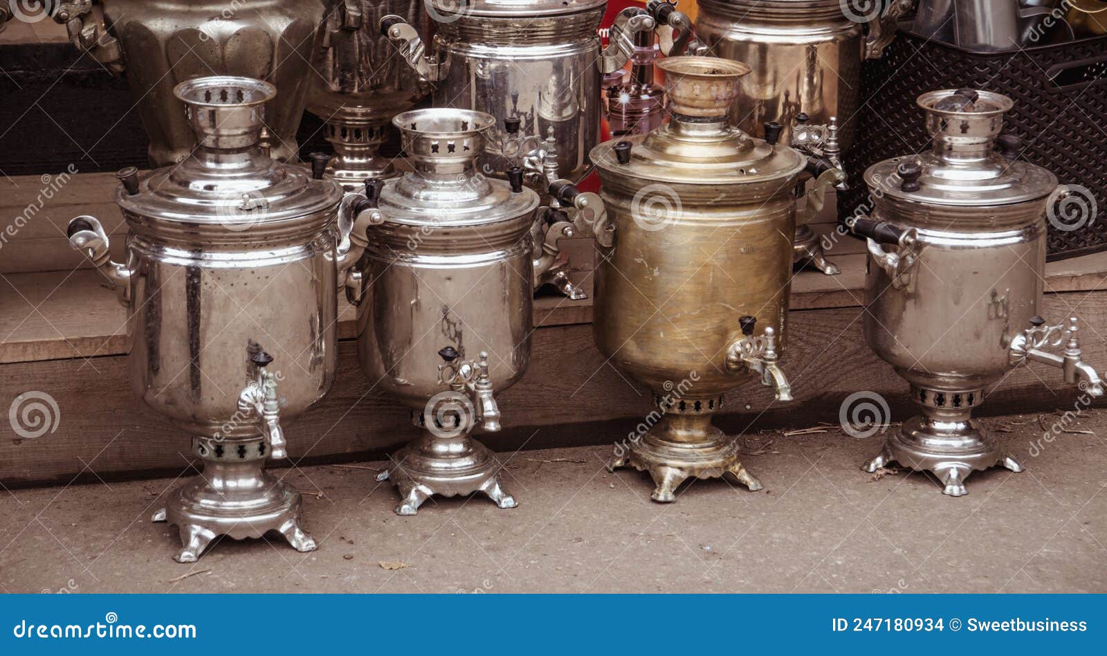 Old samovars in row. stock photo. Image of samovars - 247180934