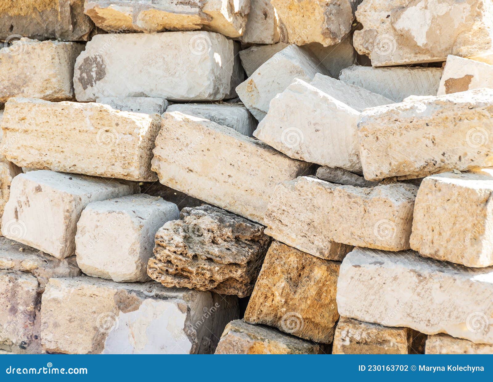 Old Sandstone Bricks in a Yard. Sandstone Brick Pile Close Up Stock ...