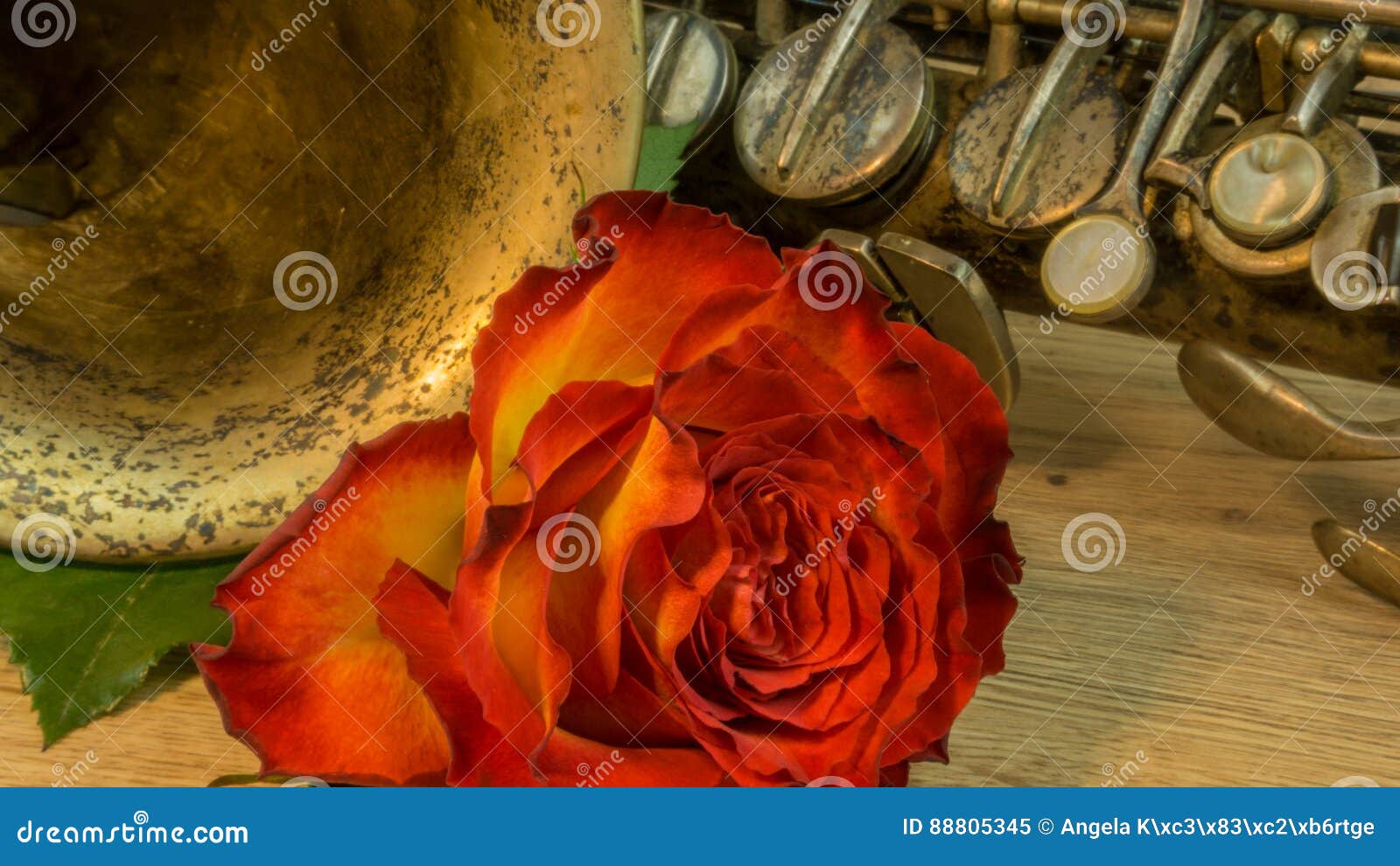 Old saxophone with roses stock image. Image of music - 88805345