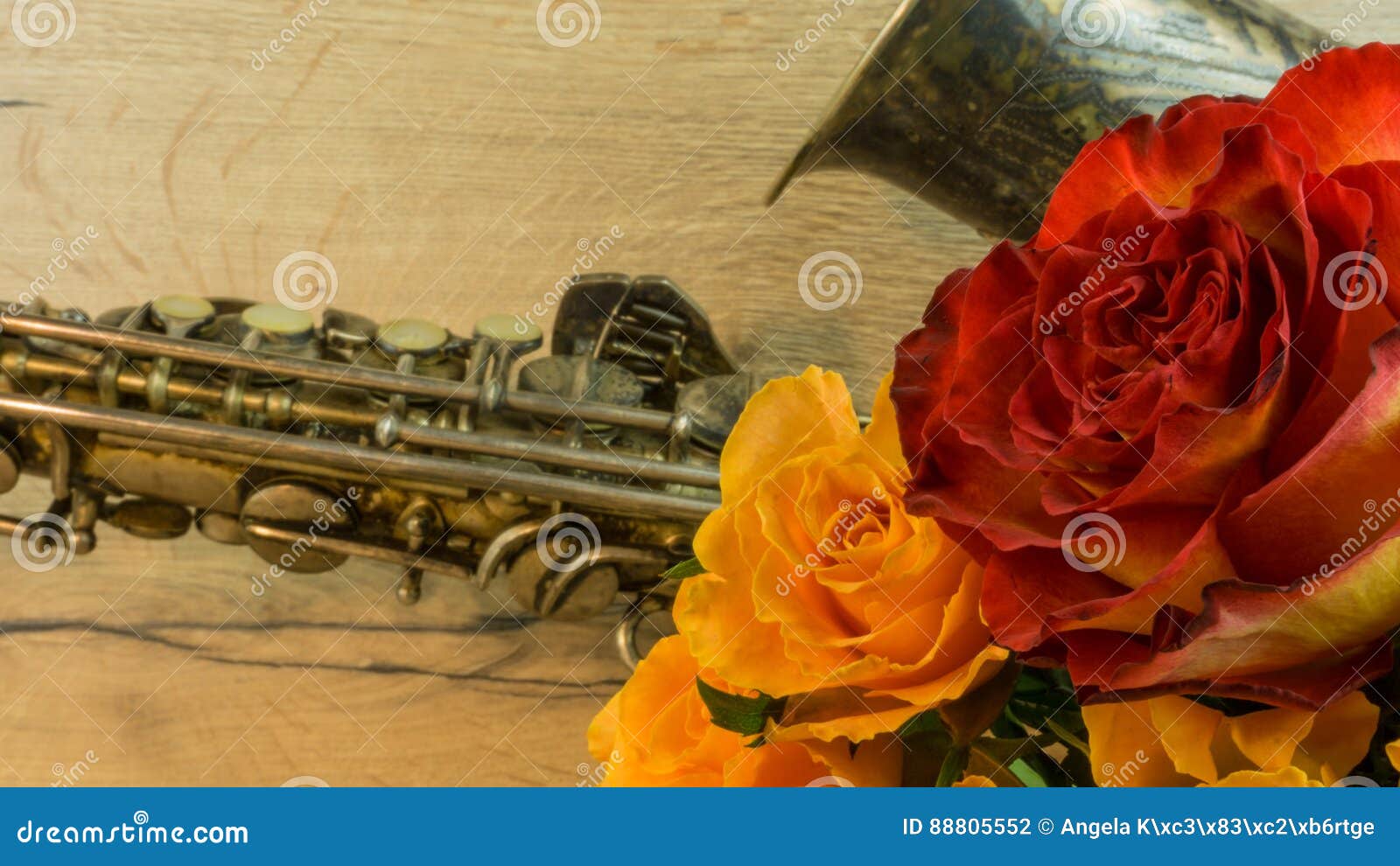 Old saxophone with roses stock photo. Image of sound - 88805552