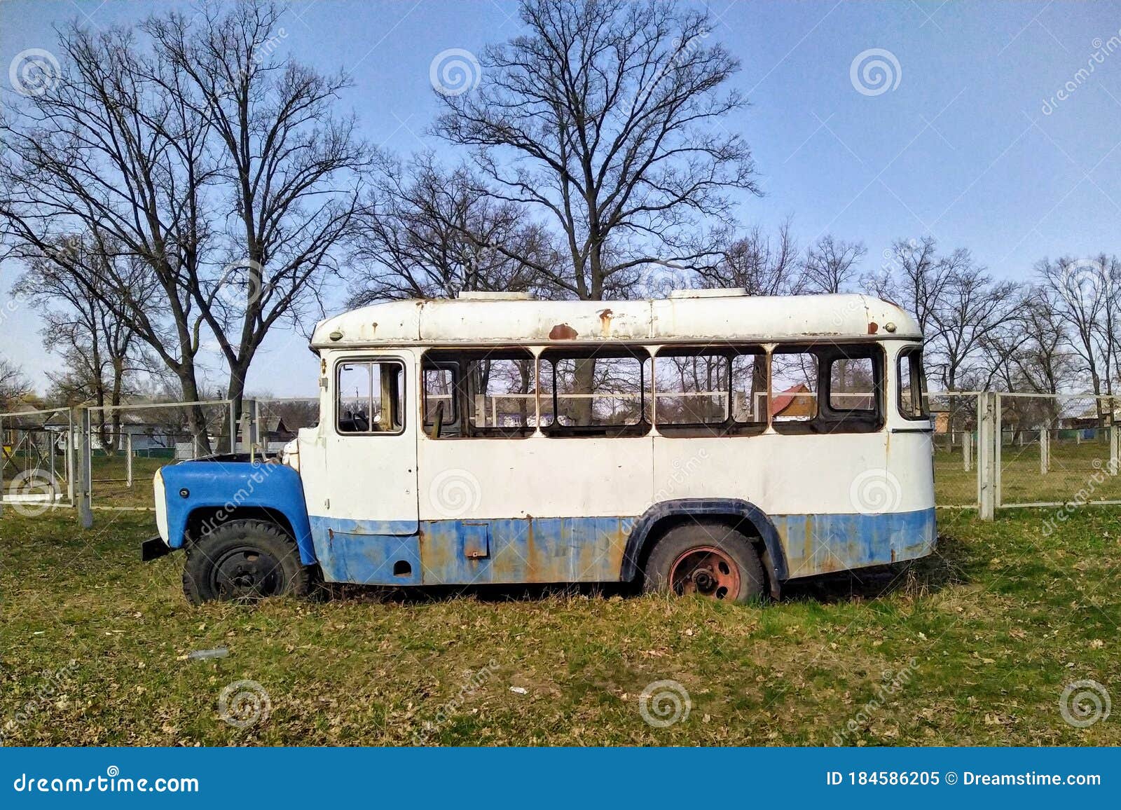 Old School Bus in Yard in Village at Spring Stock Image - Image of ...